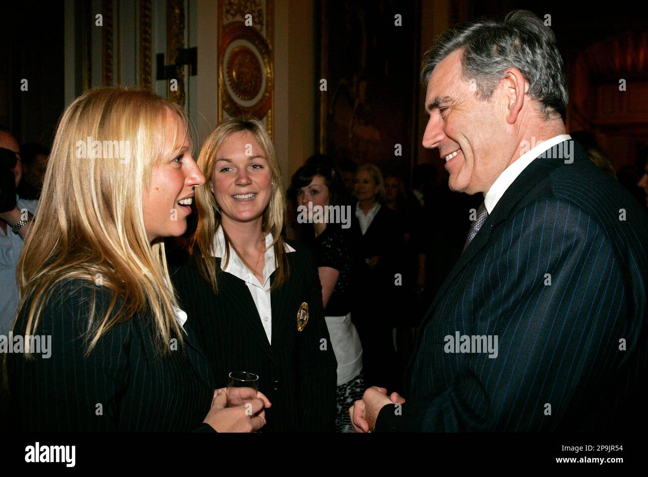 Britain's Prime Minister Gordon Brown, right, talks to Olympic Yngling ...