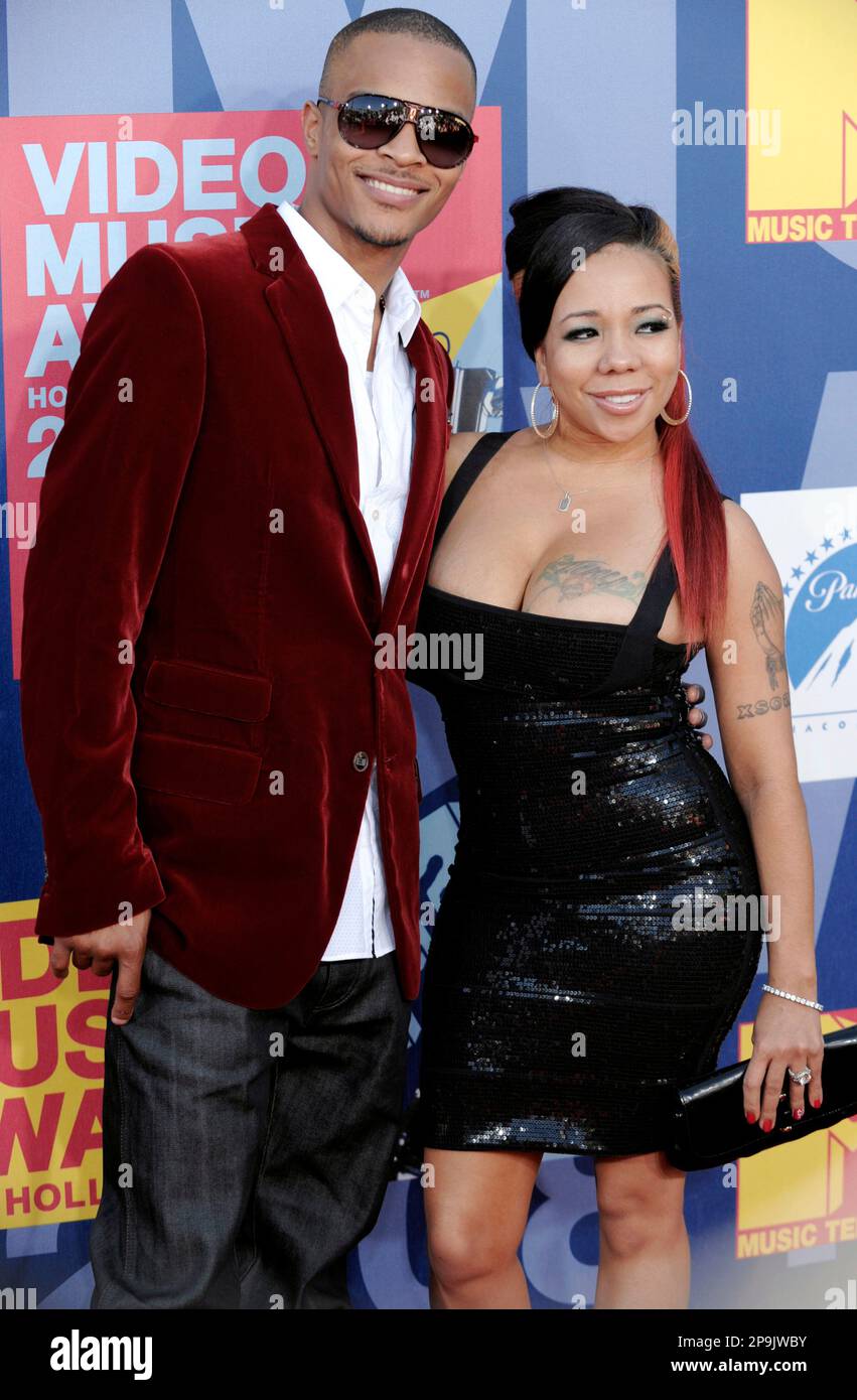 ** FILE ** In this Sept. 7, 2008 file photo, T.I. and wife Tameka "Tiny ...