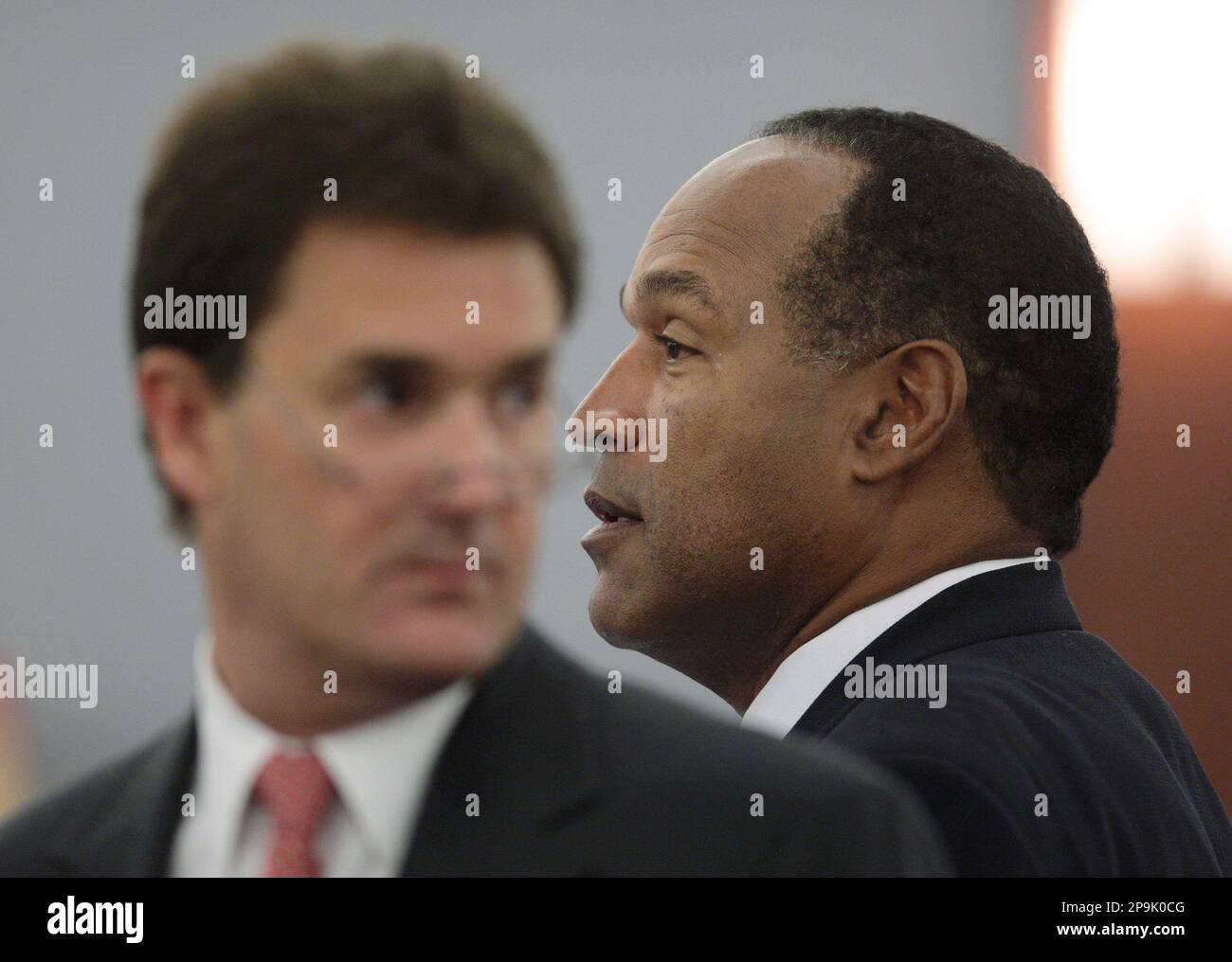 O.J. Simpson, right, and his attorney Yale Galanter appear during ...