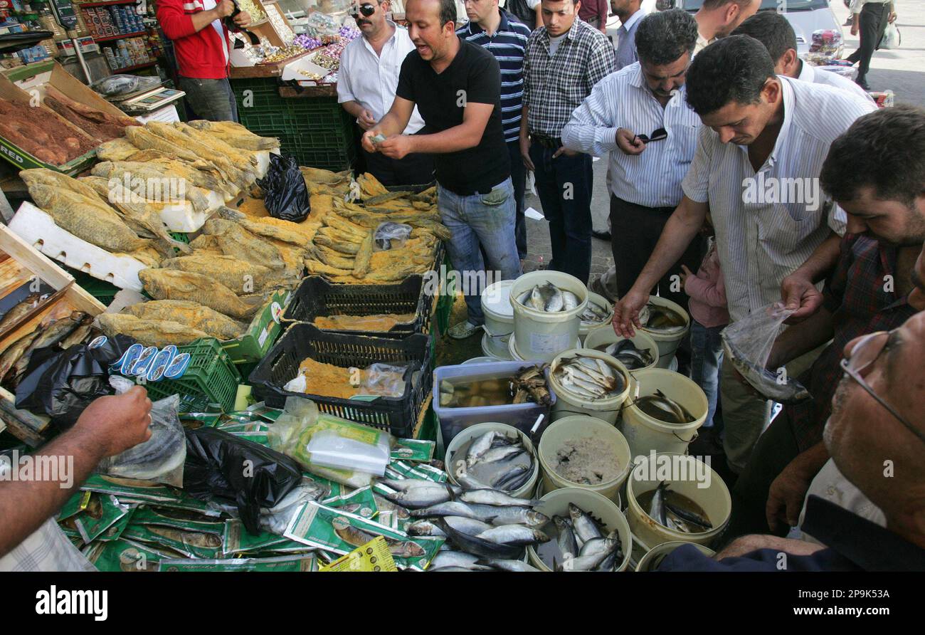 People shop in Jordan’s capital, Amman, center on Monday Sep. 29, 2008 ...