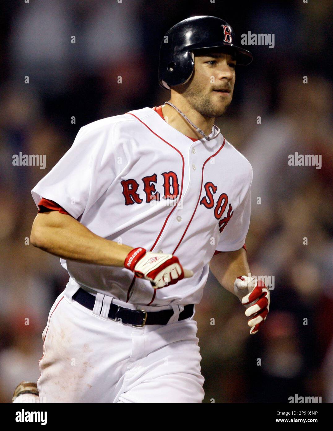 Boston Red Sox's Jonathan Van Every runs to first after hitting his ...