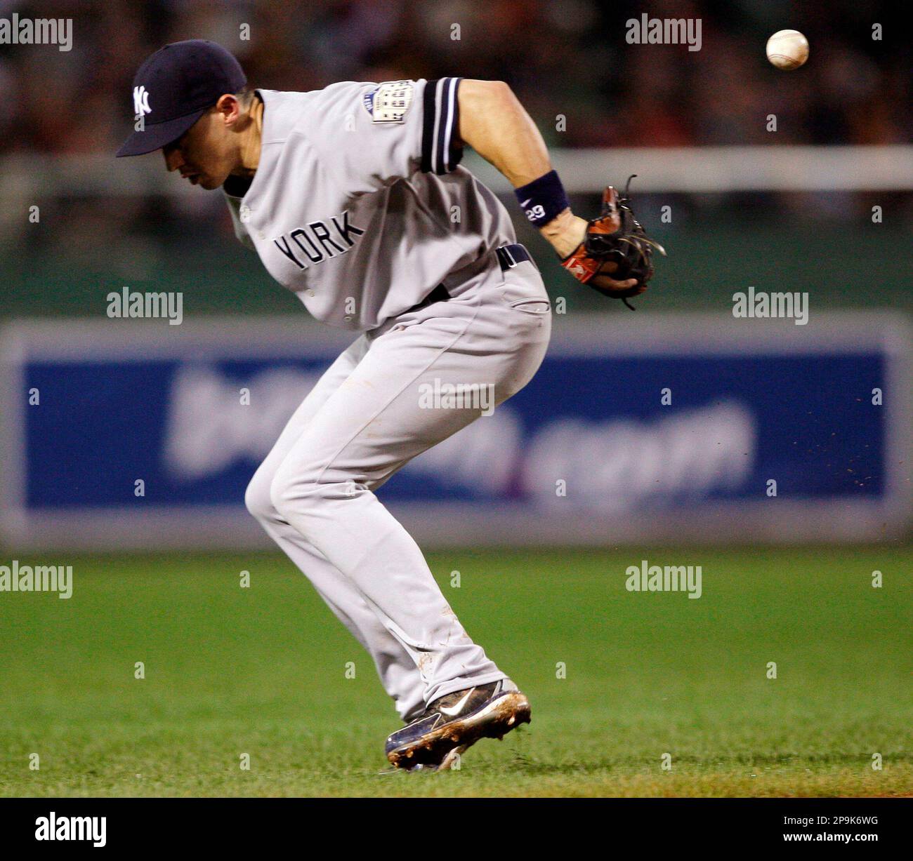 New York Yankees shortstop Cody Ransom bobbles a grounder, which ...