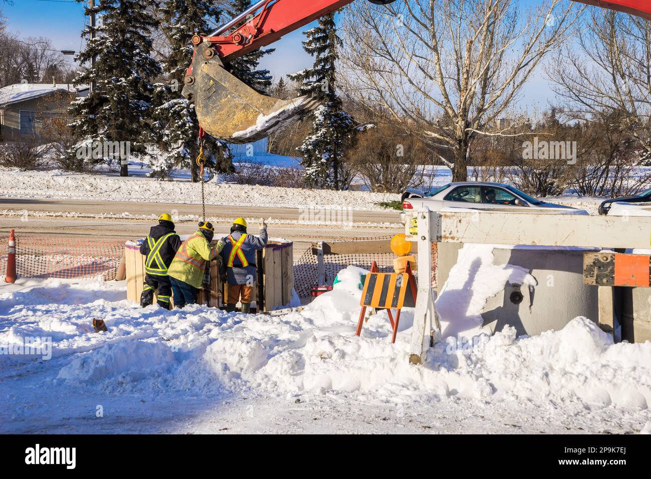 A crew works in public work storm system renovation project Stock Photo ...