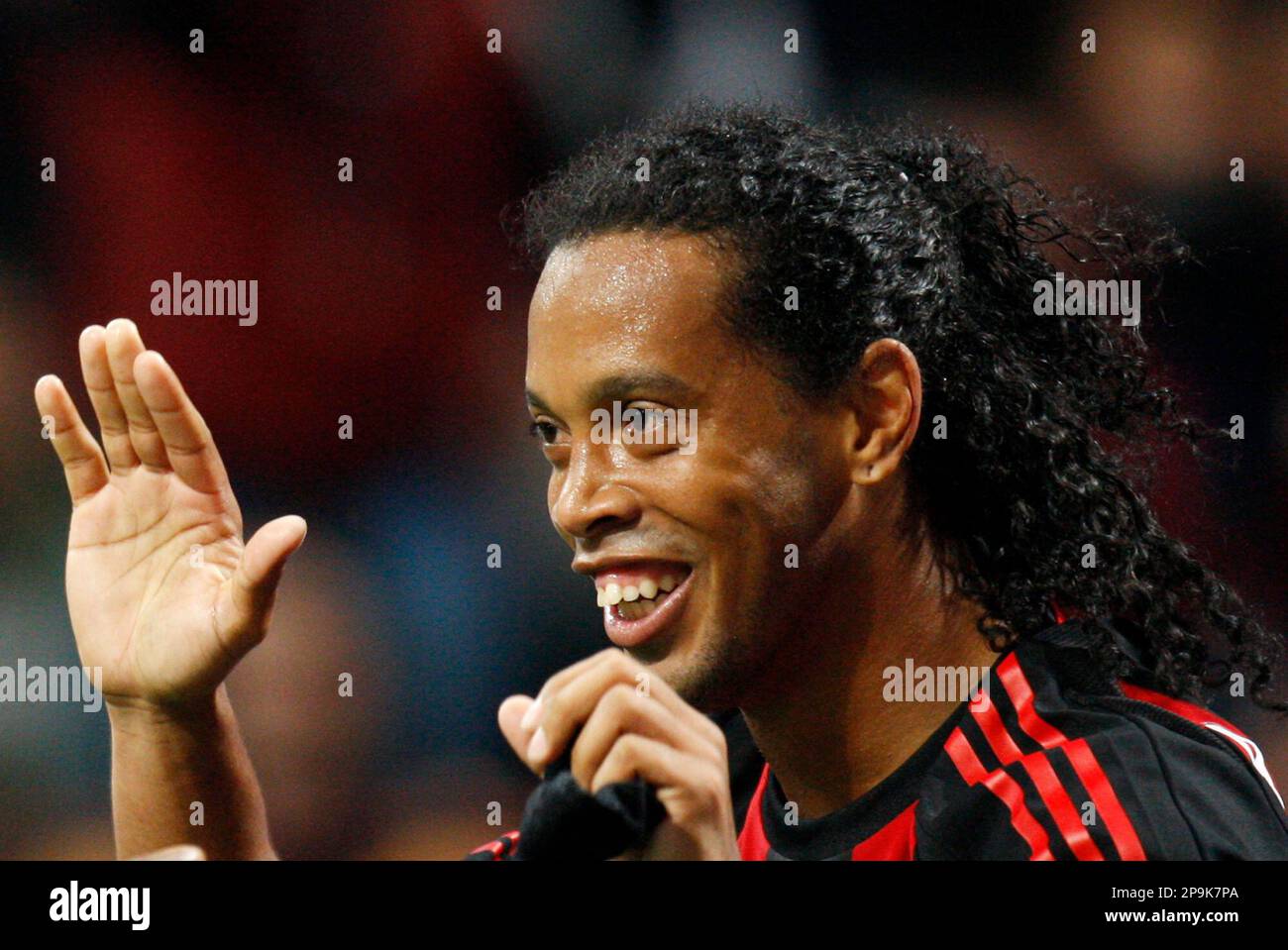 AC Milan Brazilian forward Ronaldinho reacts after scoring a goal ...