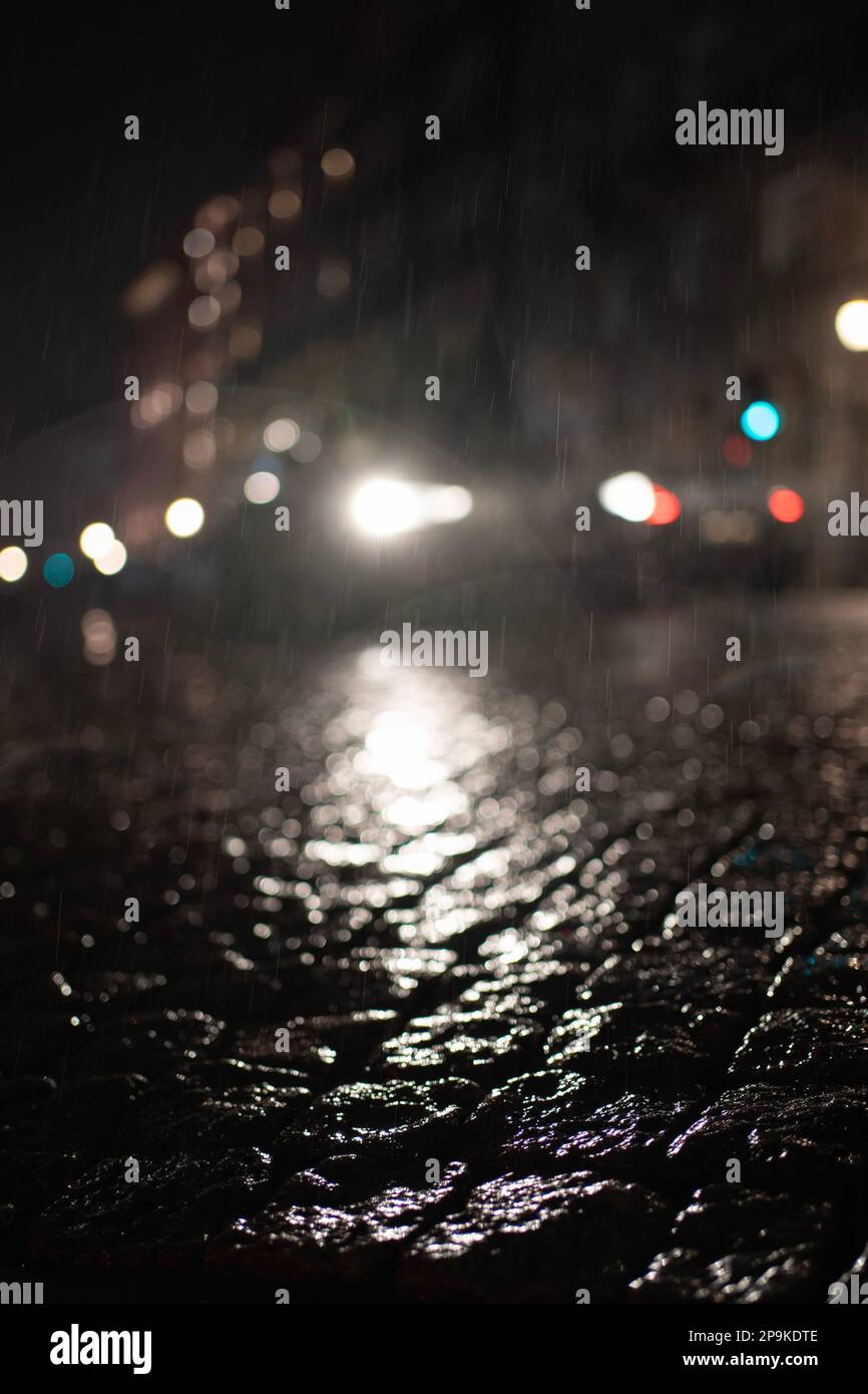 Car headlight glare in street hi-res stock photography and images - Alamy