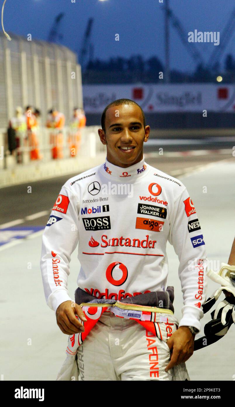 McLaren Mercedes Formula One driver Lewis Hamilton of Britain walks ...