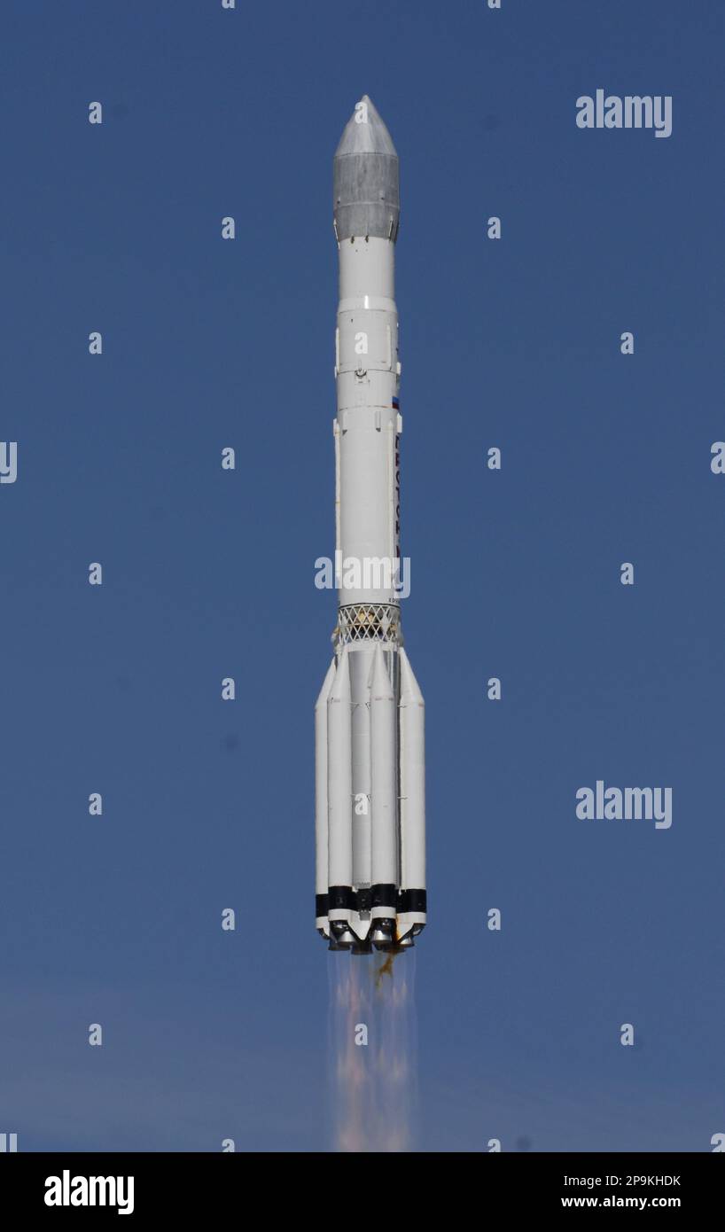 A Russian Proton booster rocket blasts off from Baikonur cosmodrome ...