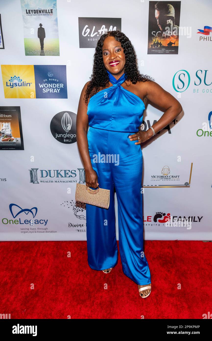 Actress "Linked by Love" Michelle N. Carter attends Suzanne ...