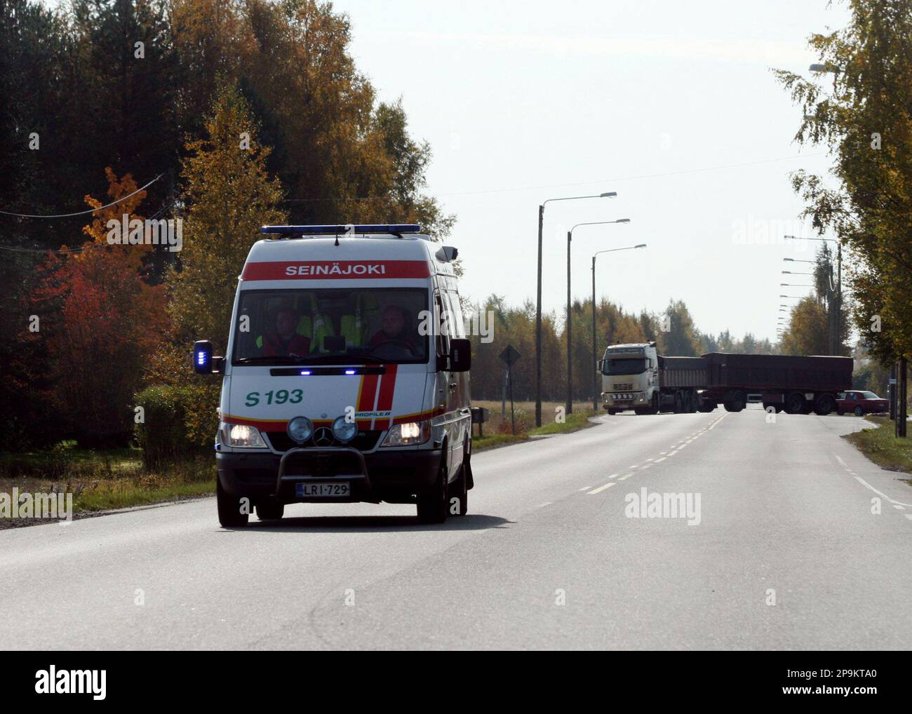 An ambulance attends the scene of a school shooting In Kauhajoki ...