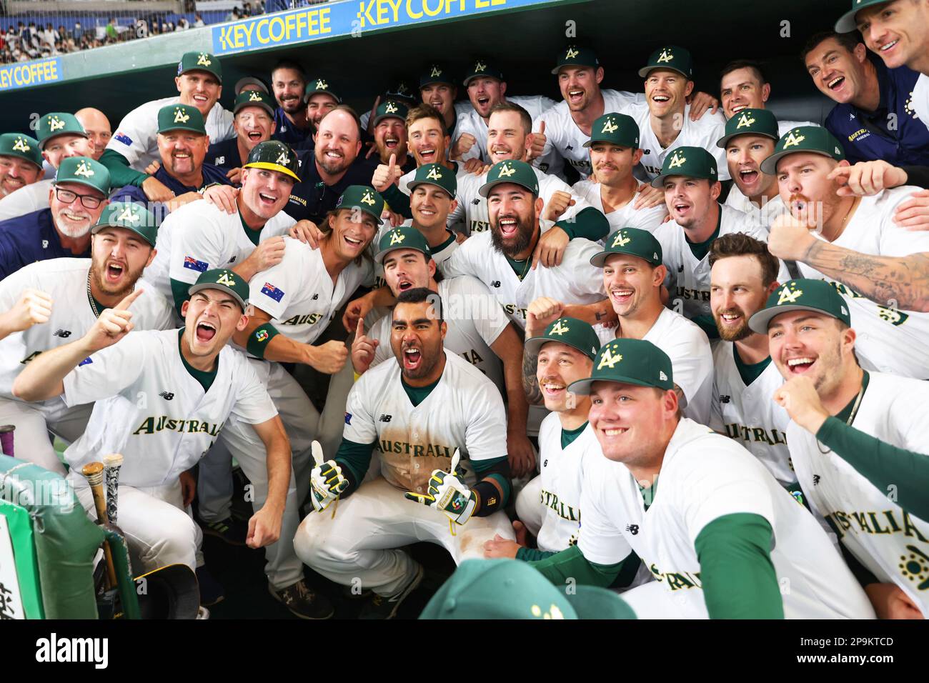 Australia's players pose for a photo after winning the World Baseball ...