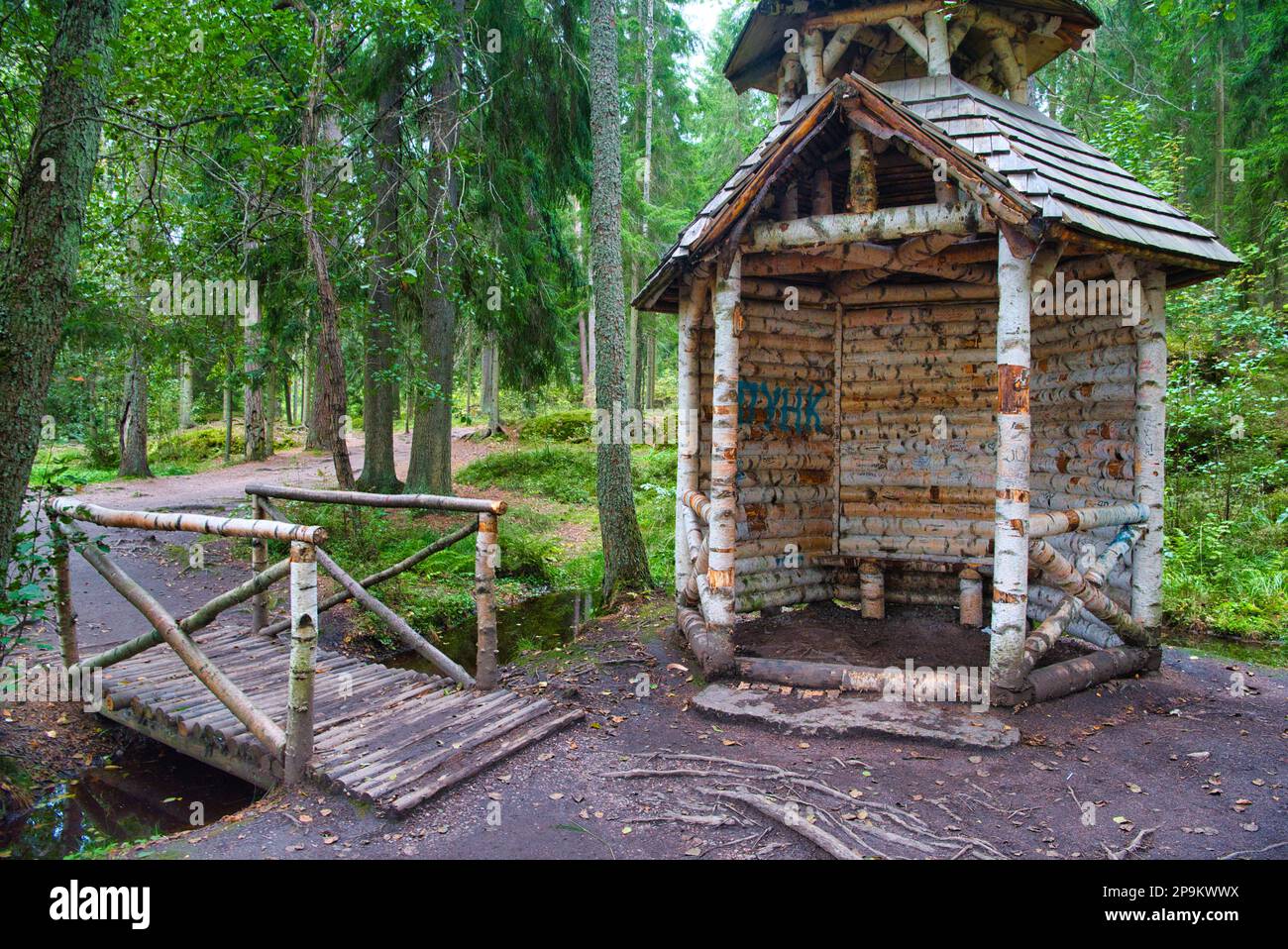 Birch booth shack and small bridge in the forest, Park Mon Repos ...
