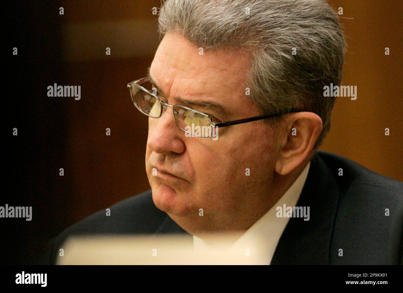 John Connolly, a former FBI agent, listens to testimony from Stephen ...