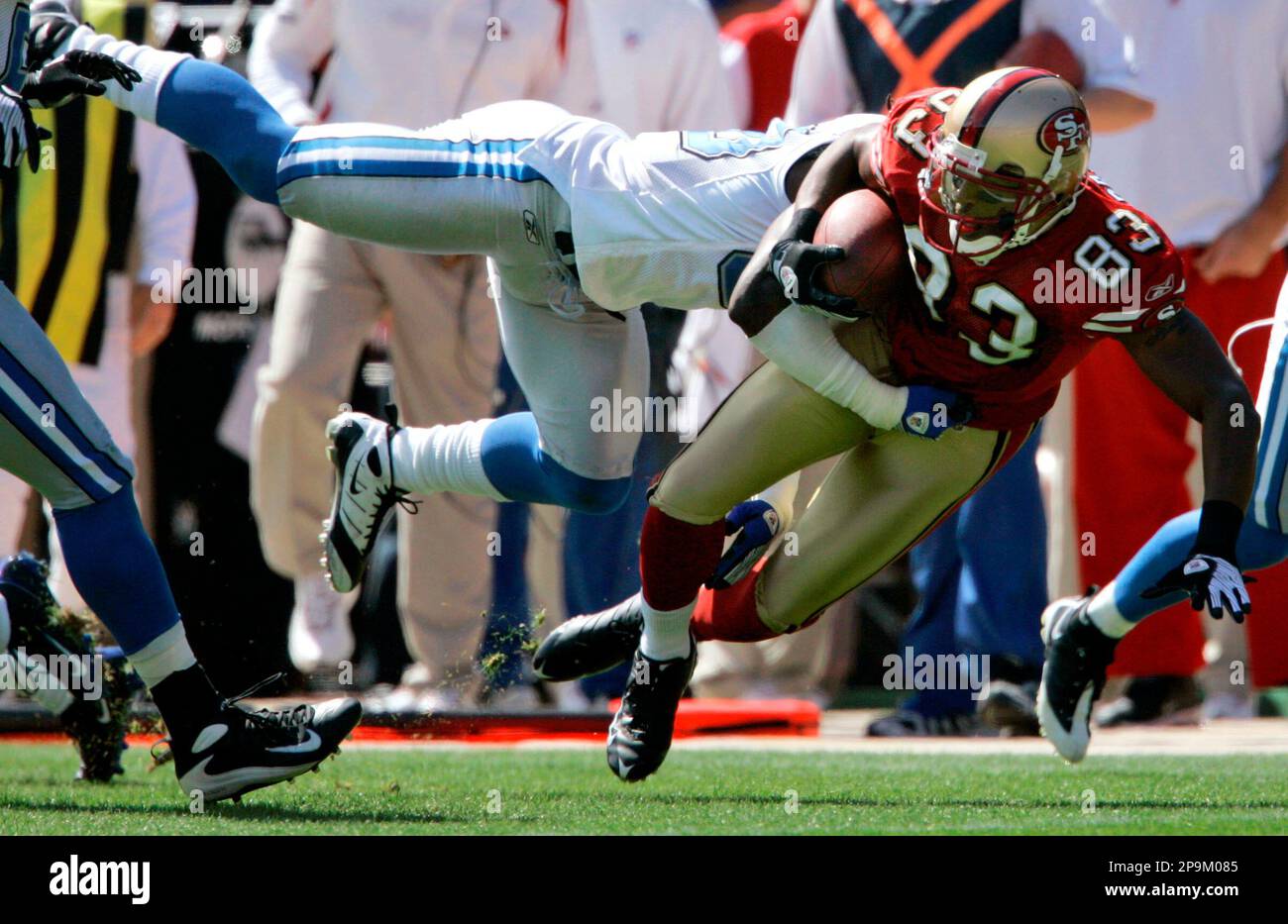 Detroit Lions' Ernie Sims, left, tackles San Francisco 49ers' Arnaz ...