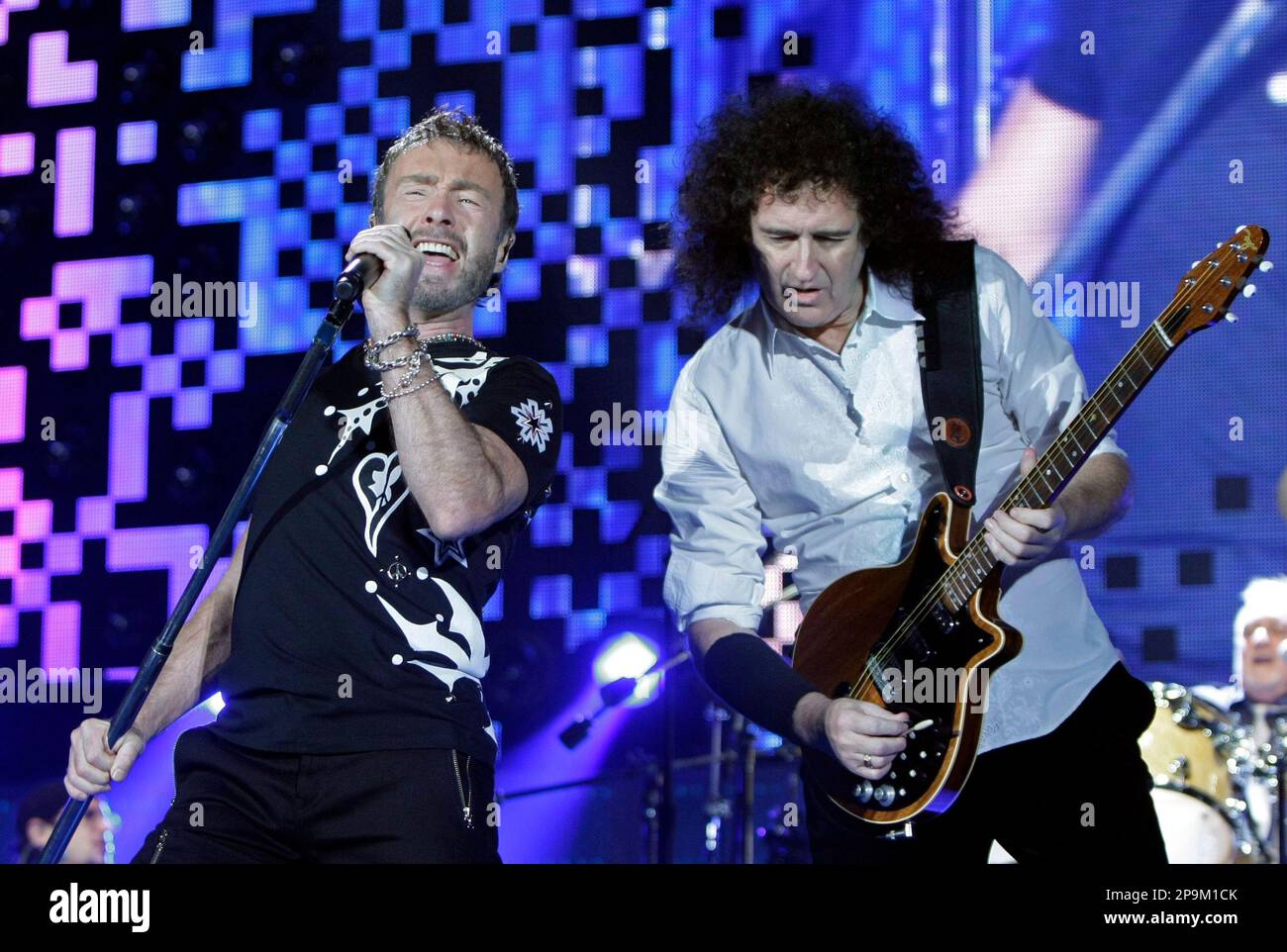 Singer Paul Rodgers, and Brian May, from left, of British band Queen ...