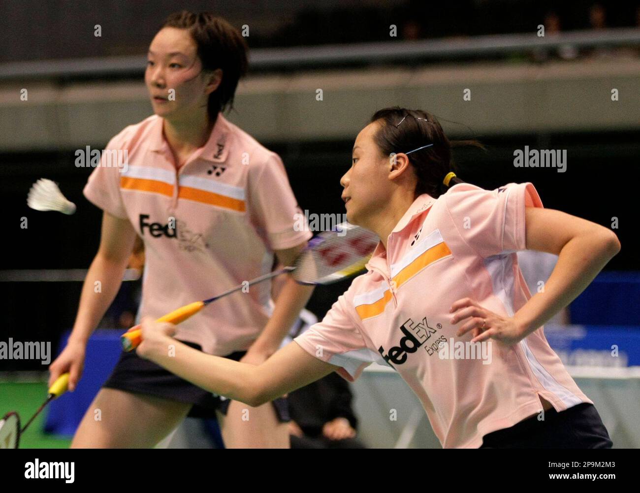 China's Cheng Shu, left, looks on as Zhao Yunlei returns a shot against ...