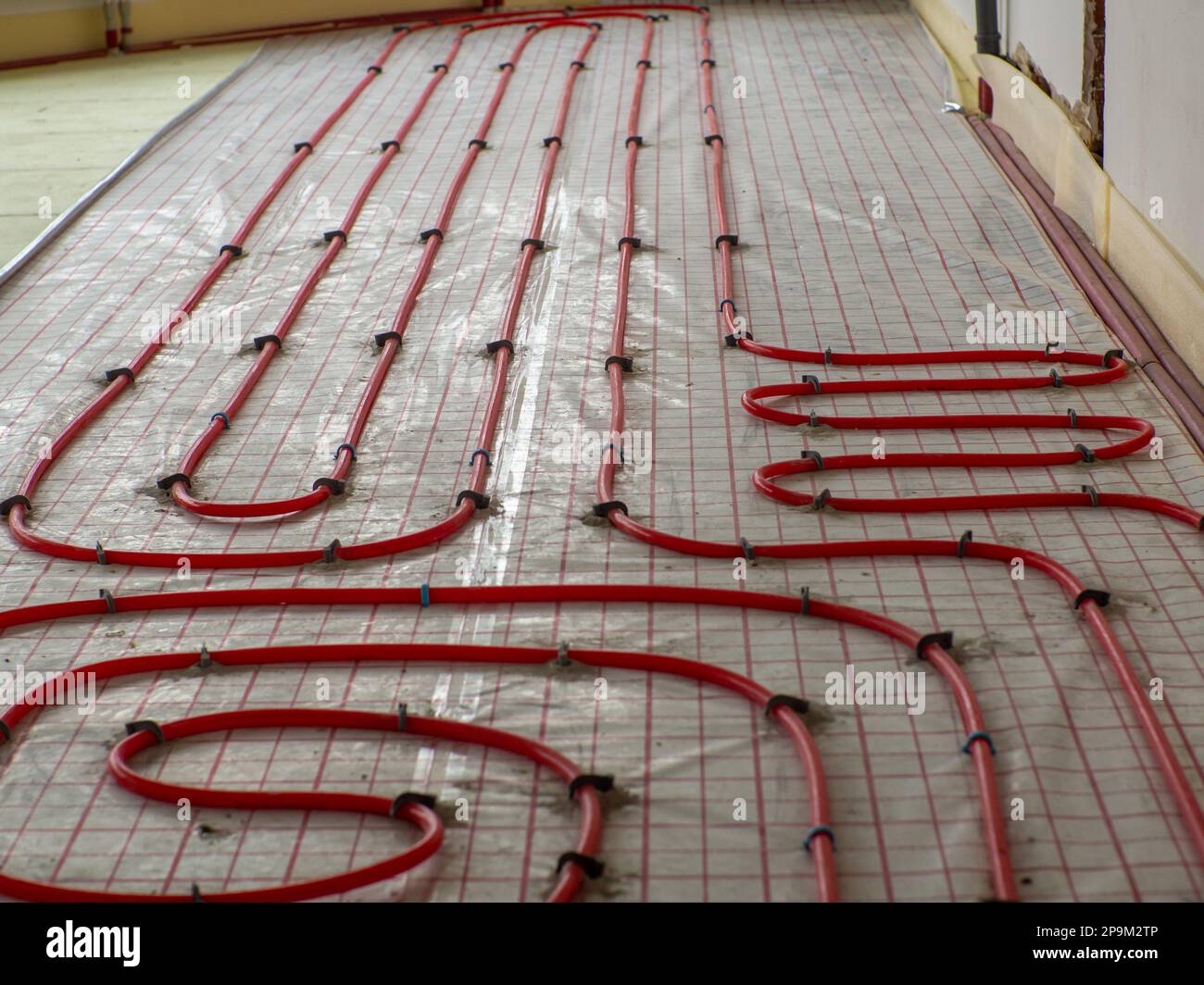 Underfloor heating installation Stock Photo - Alamy