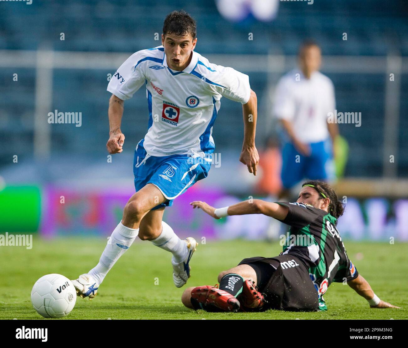 Cruz Azul's Nicolas Ignacio Vigneri of Uruguay, left, controls the ball ...
