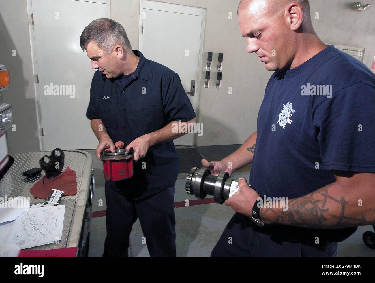 Lt. John Robinson, left, and firefighter Chris Haley of the Beaufort ...