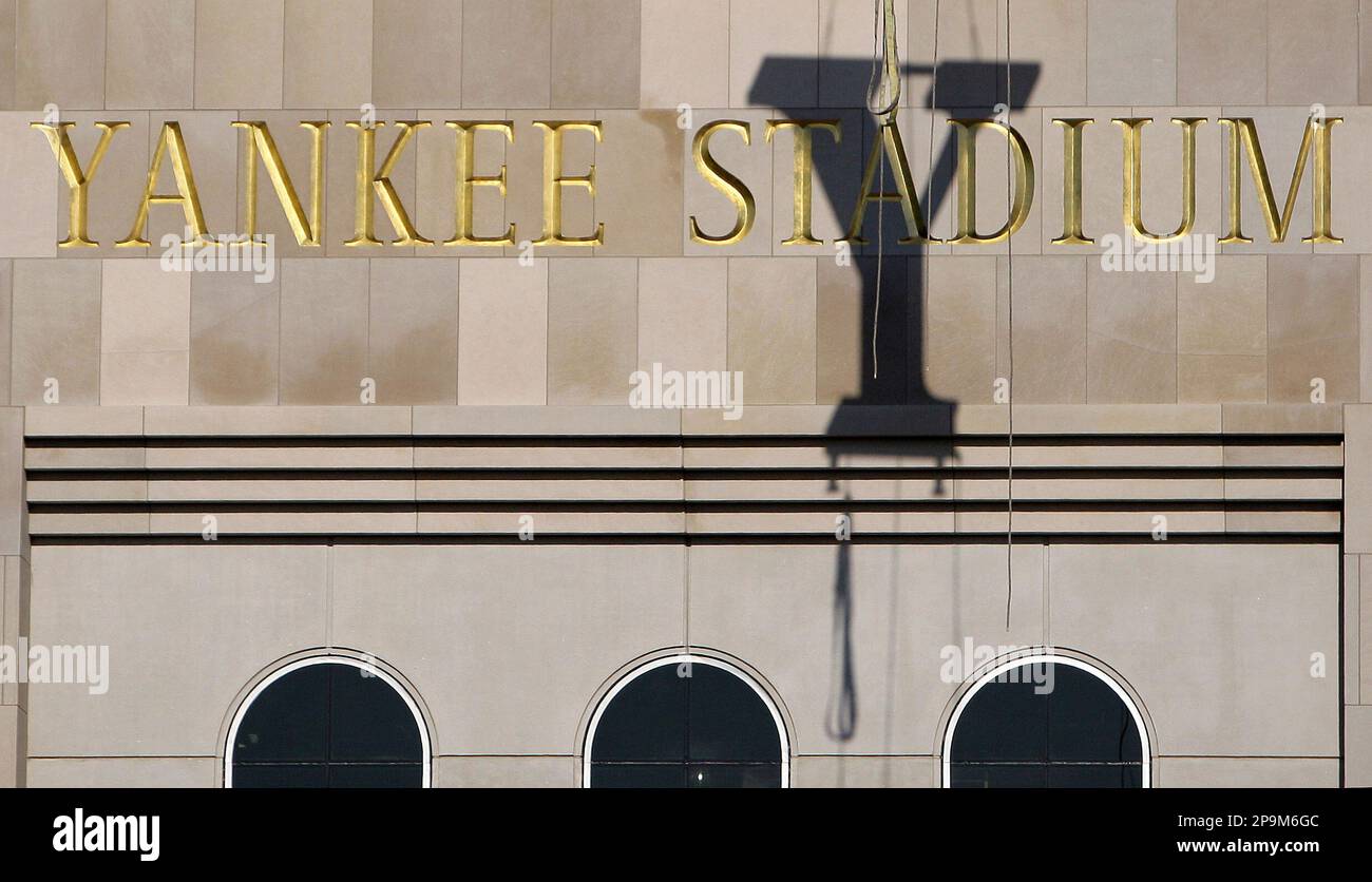 The shadow of a giant letter Y being raised atop the New Yankee Stadium ...