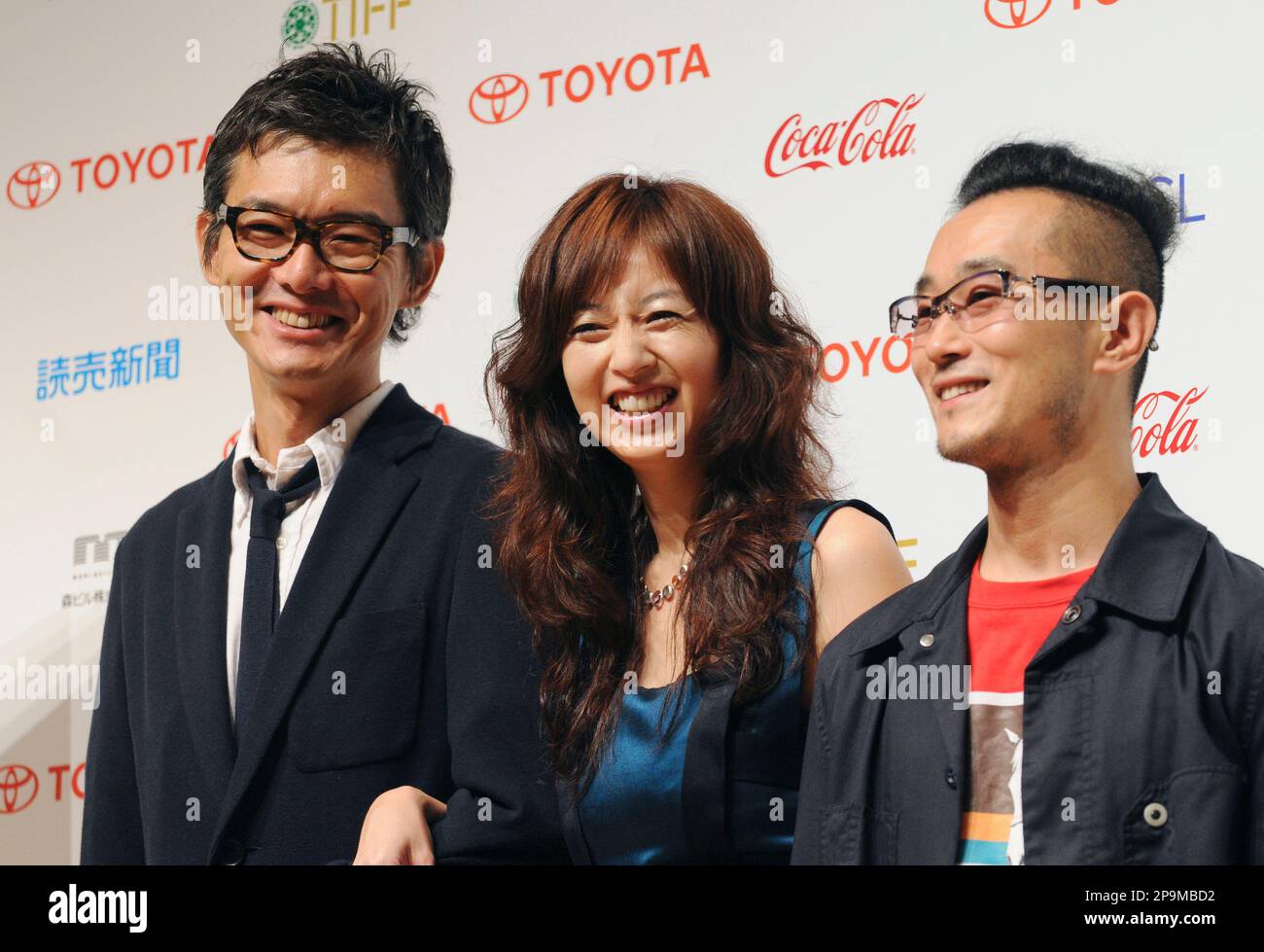 Japanese actors, Atsuro Watabe, left, and Saki Takaoka, center, and ...