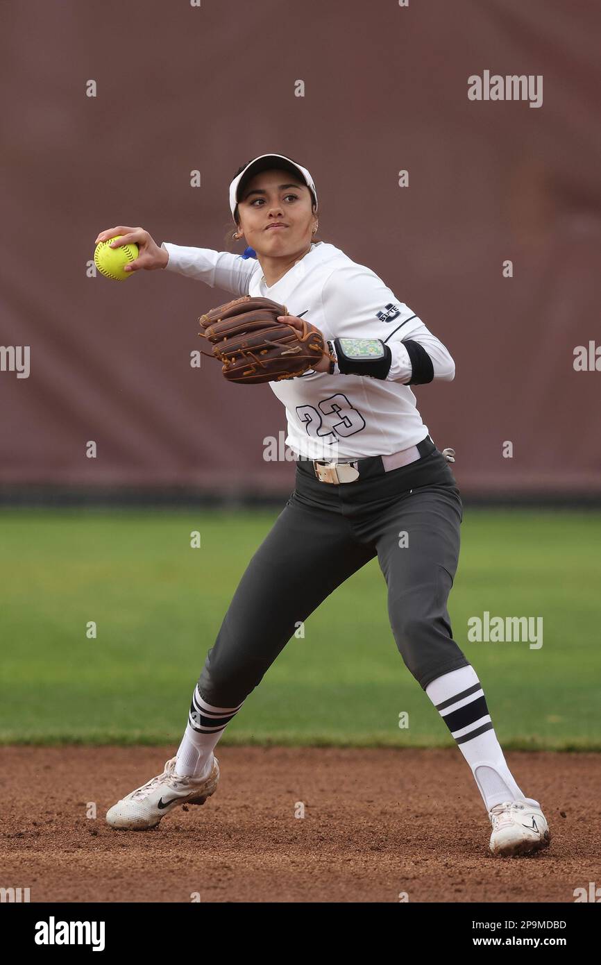 Ariel Fifita (23) of Utah State fields the ball during an NCAA softball ...