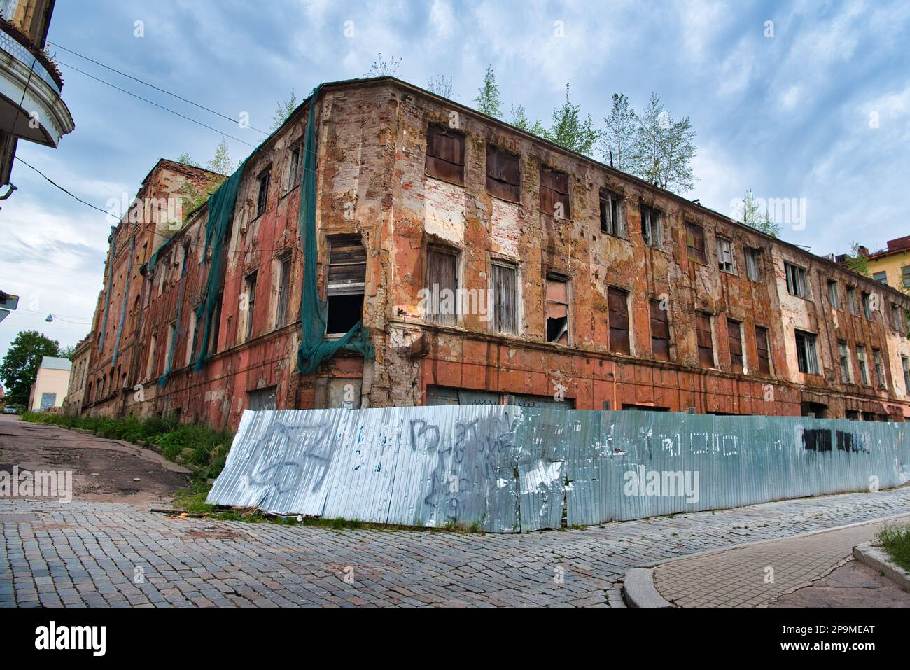 Antique ruins of brick red house in Vyborg, Russia Stock Photo - Alamy