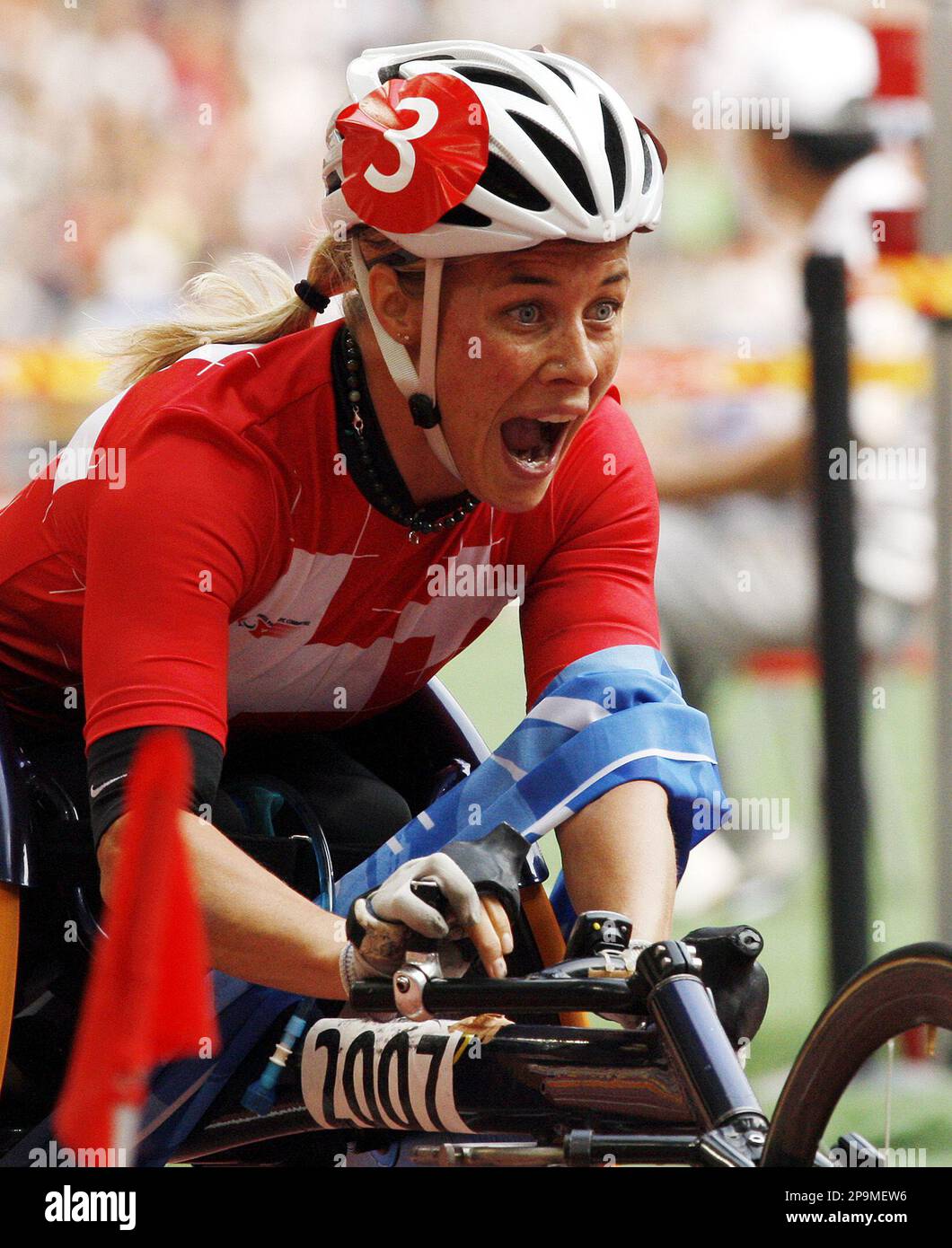 Switzerland's Edith Hunkeler reacts after winning the gold medal in the ...