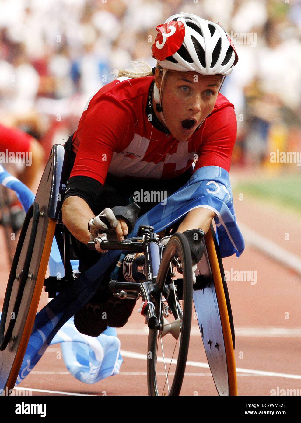 Switzerland's Edith Hunkeler reacts after winning the gold medal in the ...