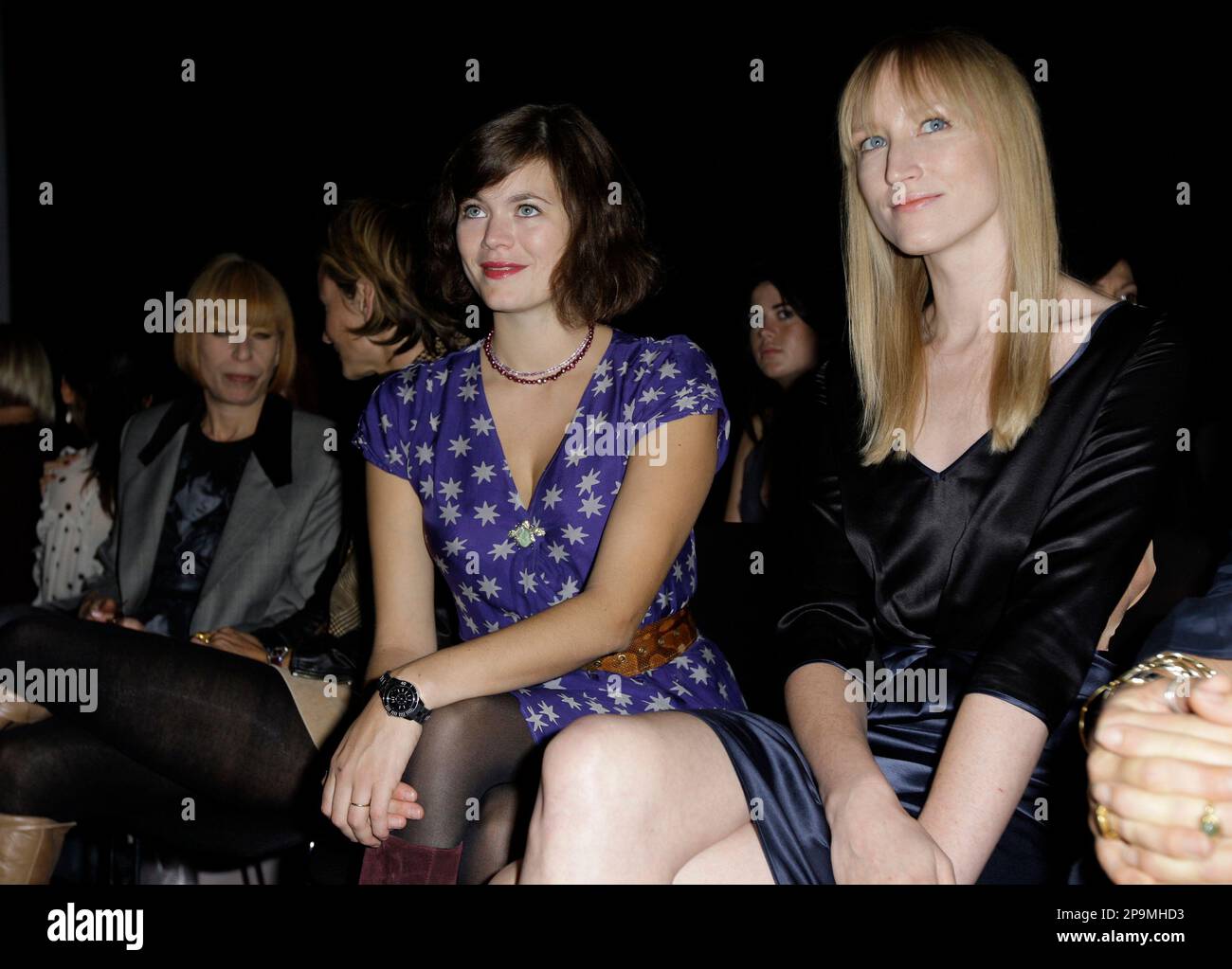 Designer Jasmine Guinness and British model Jade Parfitt, right, watch ...