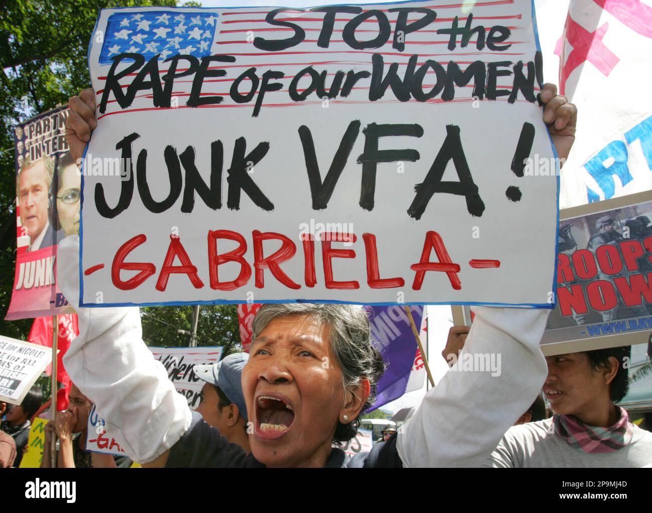 A female protester shouts slogans calling for justice to alleged rape ...