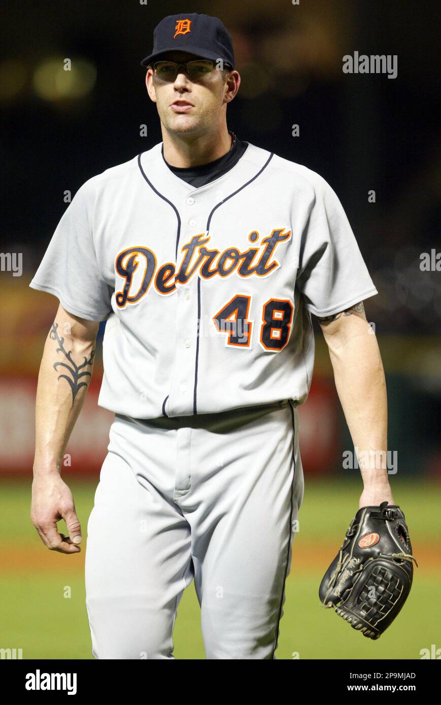 Detroit Tigers pitcher Kyle Farnsworth walks off the pitcher's mound ...