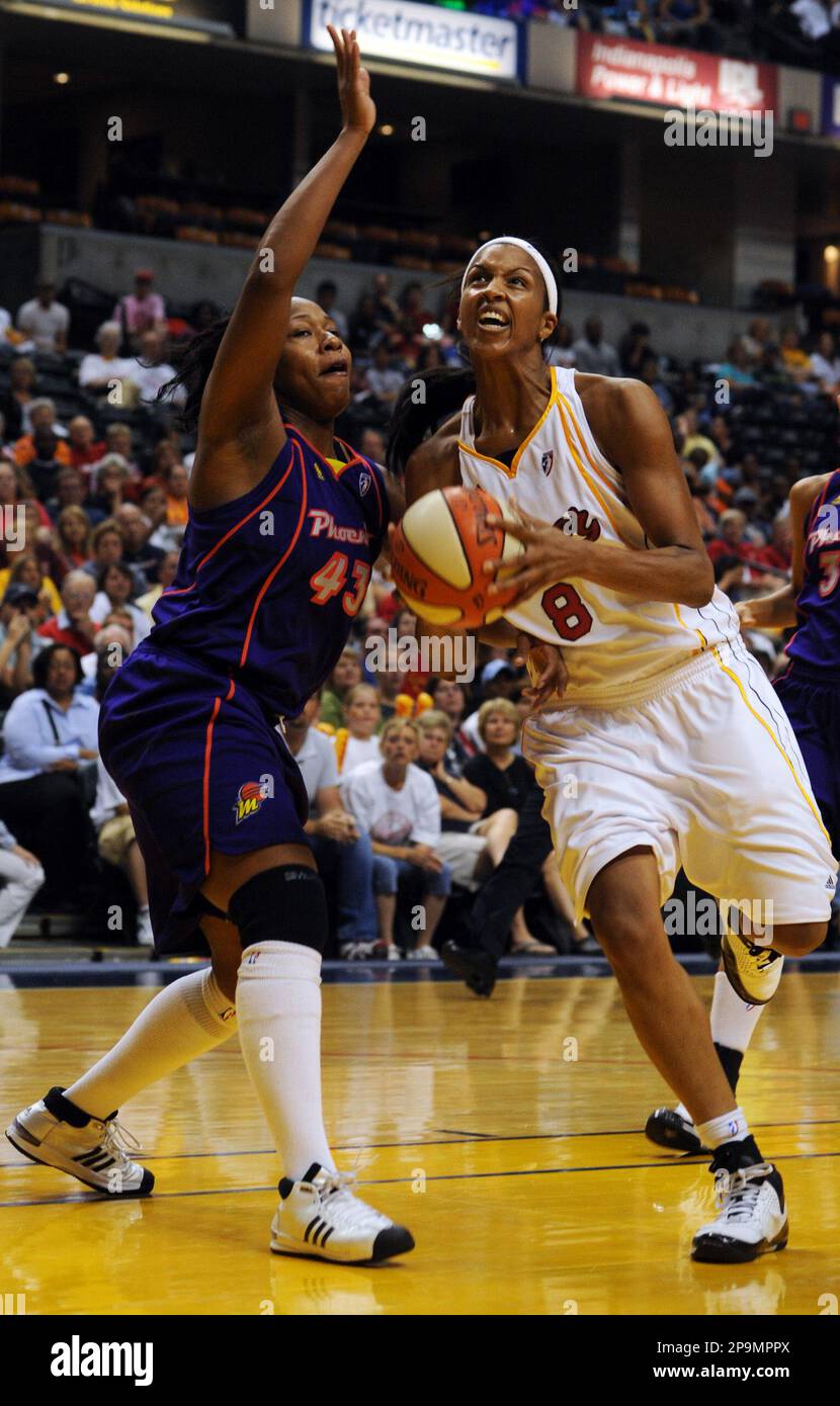 Indiana Fever center Tammy Sutton-Brown, right, drives on Phoenix ...