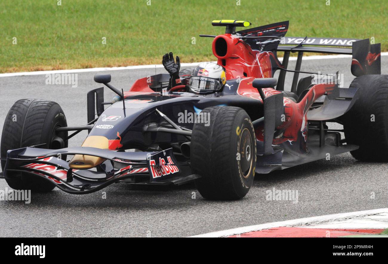 Toro Rosso driver Sebastian Vettel of Germany celebrates after winning ...