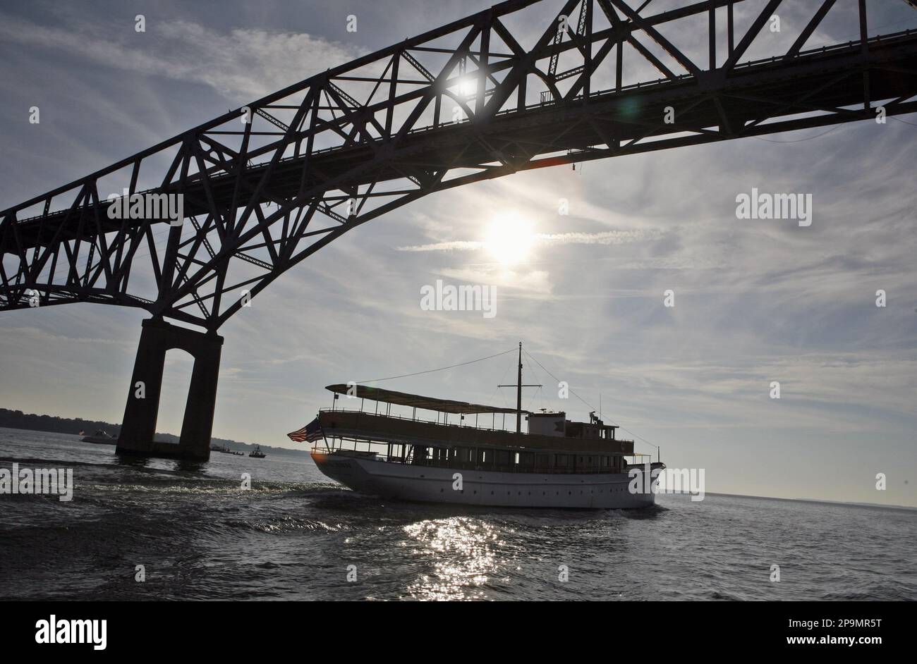 The 120-foot yacht Miss Ann, the trademark of the Tides Inn, passes ...