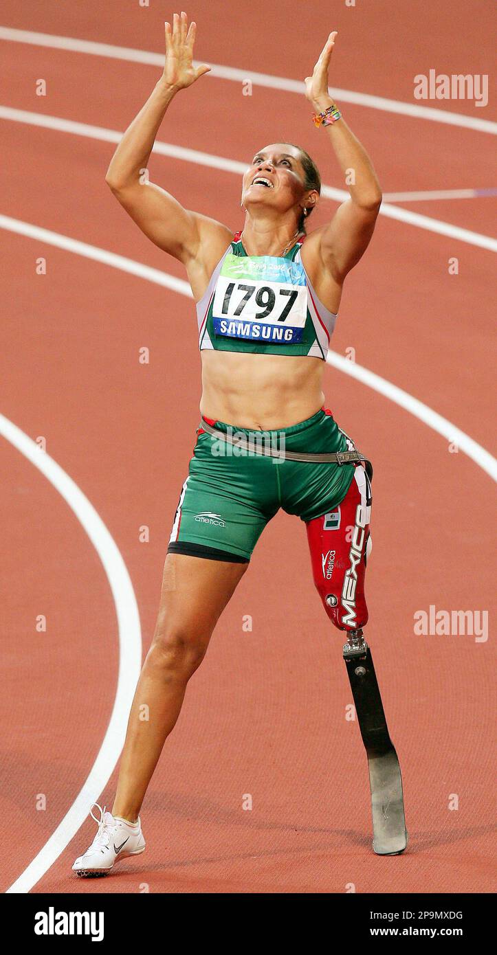 Mexico's Perla Bustamante celebrates after the women's 100m T42 final ...