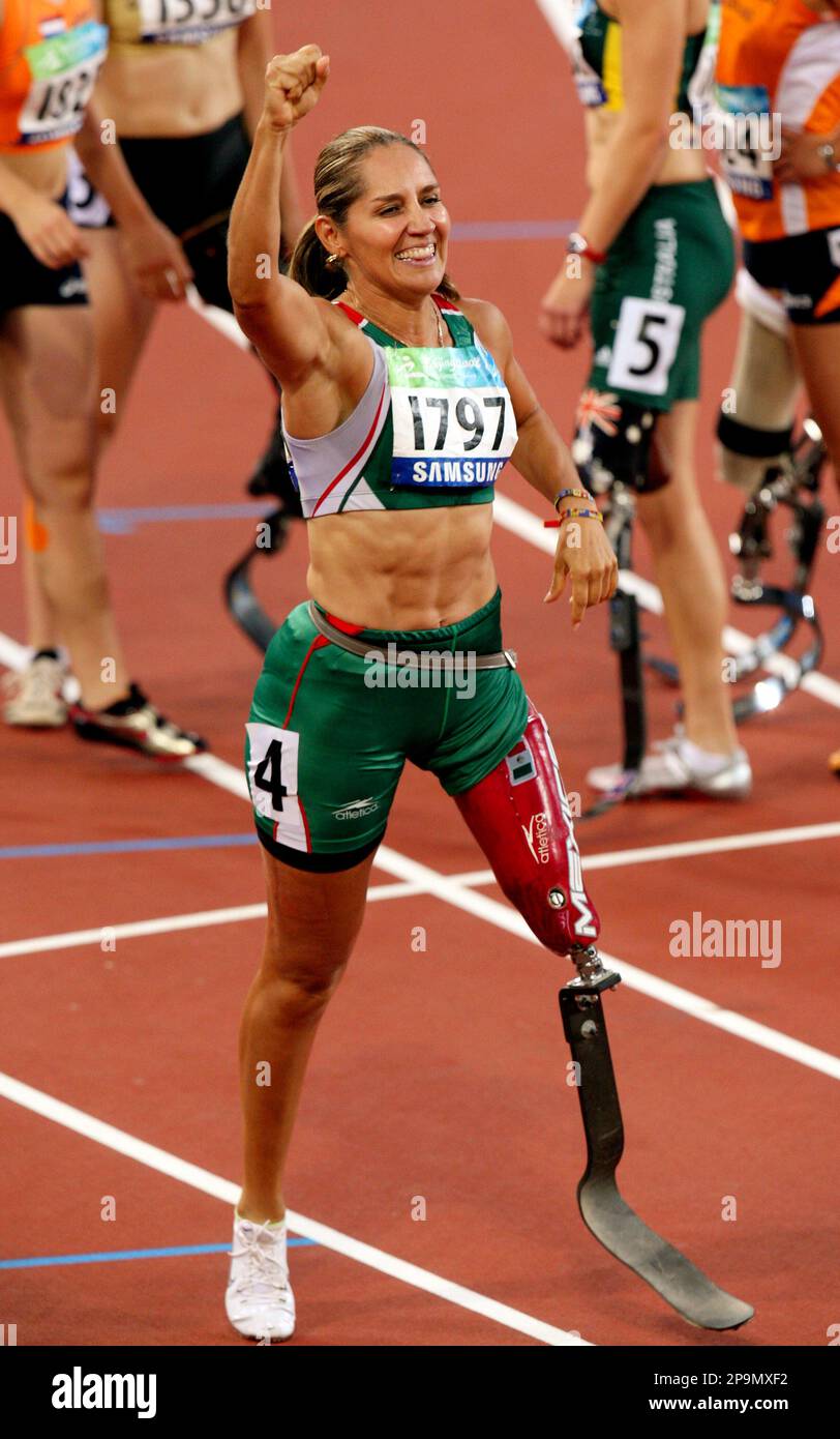 Mexico's Perla Bustamante celebrates after the women's 100m T42 final ...