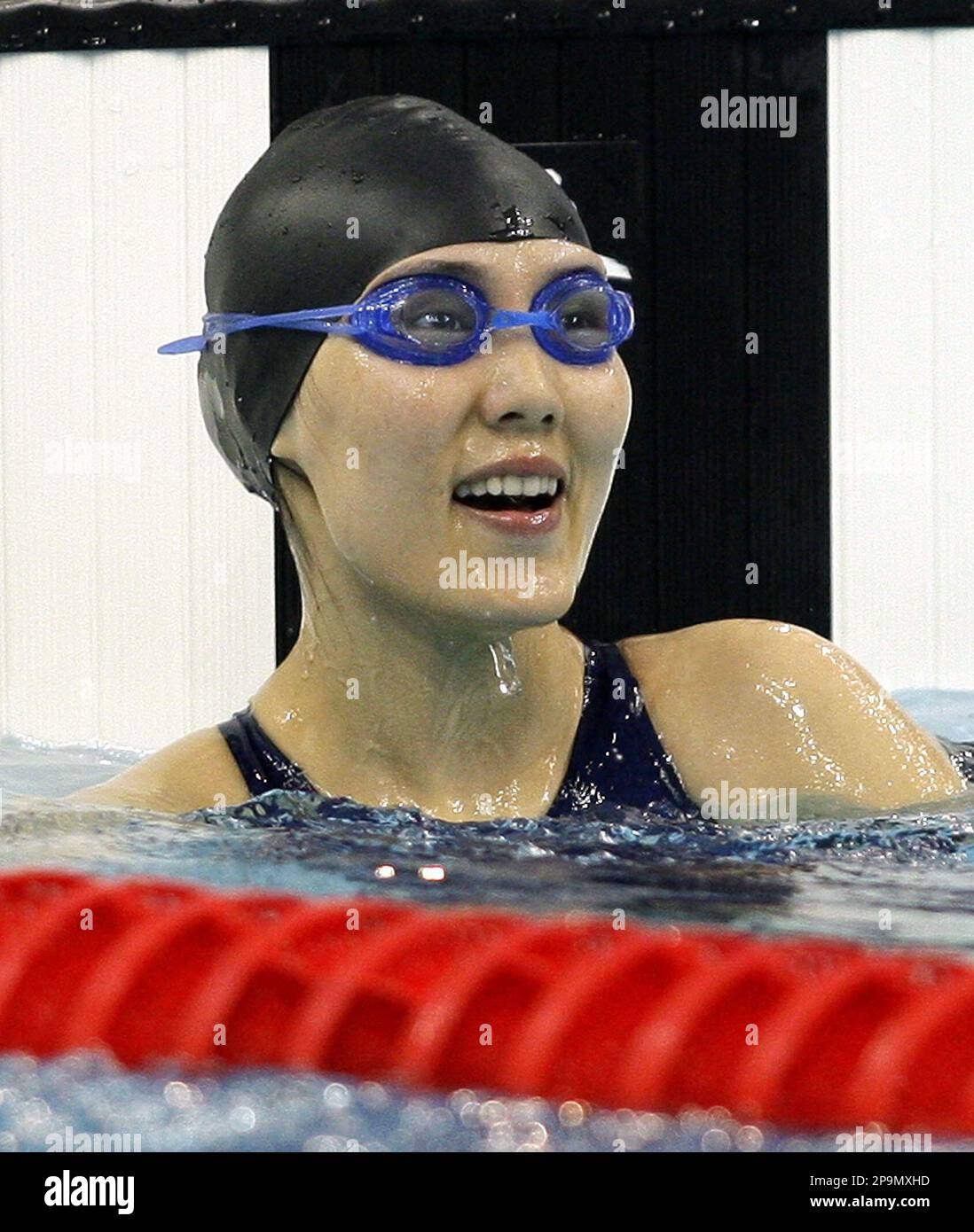 China's Huang Min celebrates her gold medal in the Women's 50m ...
