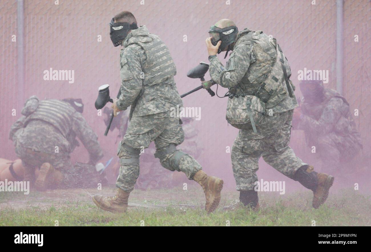 Soldiers from the 1st Infantry Division evacuate wounded while training ...