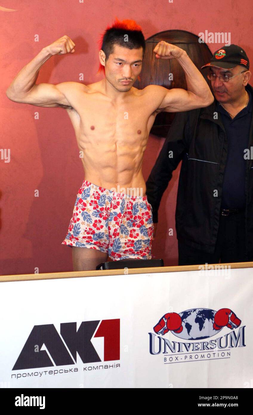 Norio Kimura of Japan poses after a news conference in Western Ukraine city Lviv, Friday, Sept ...