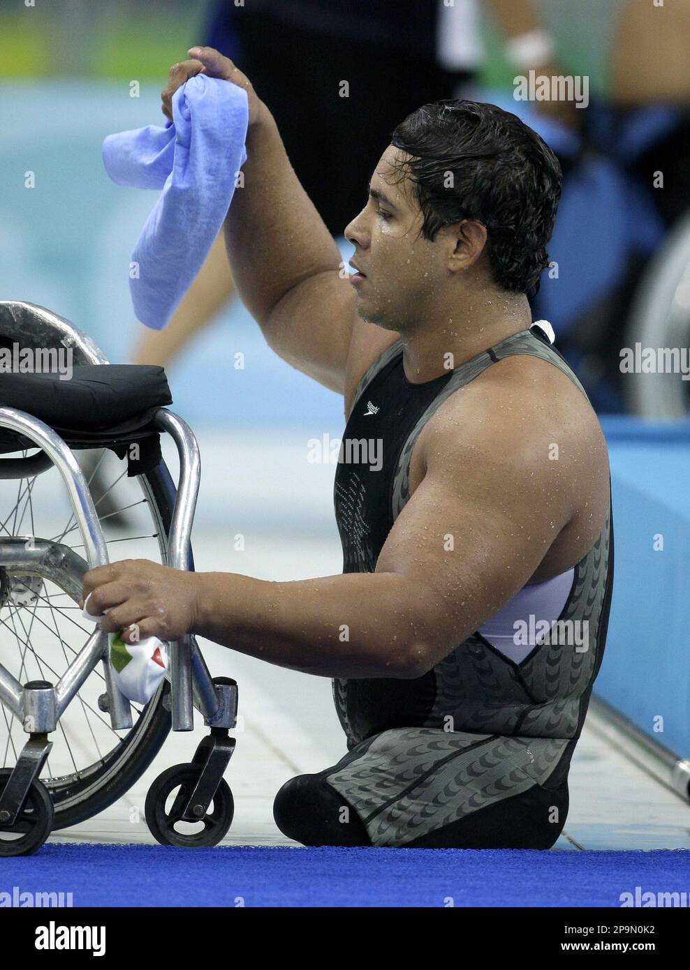 Mexico's Pedro Rangel prepares to get into his wheelchair after ...