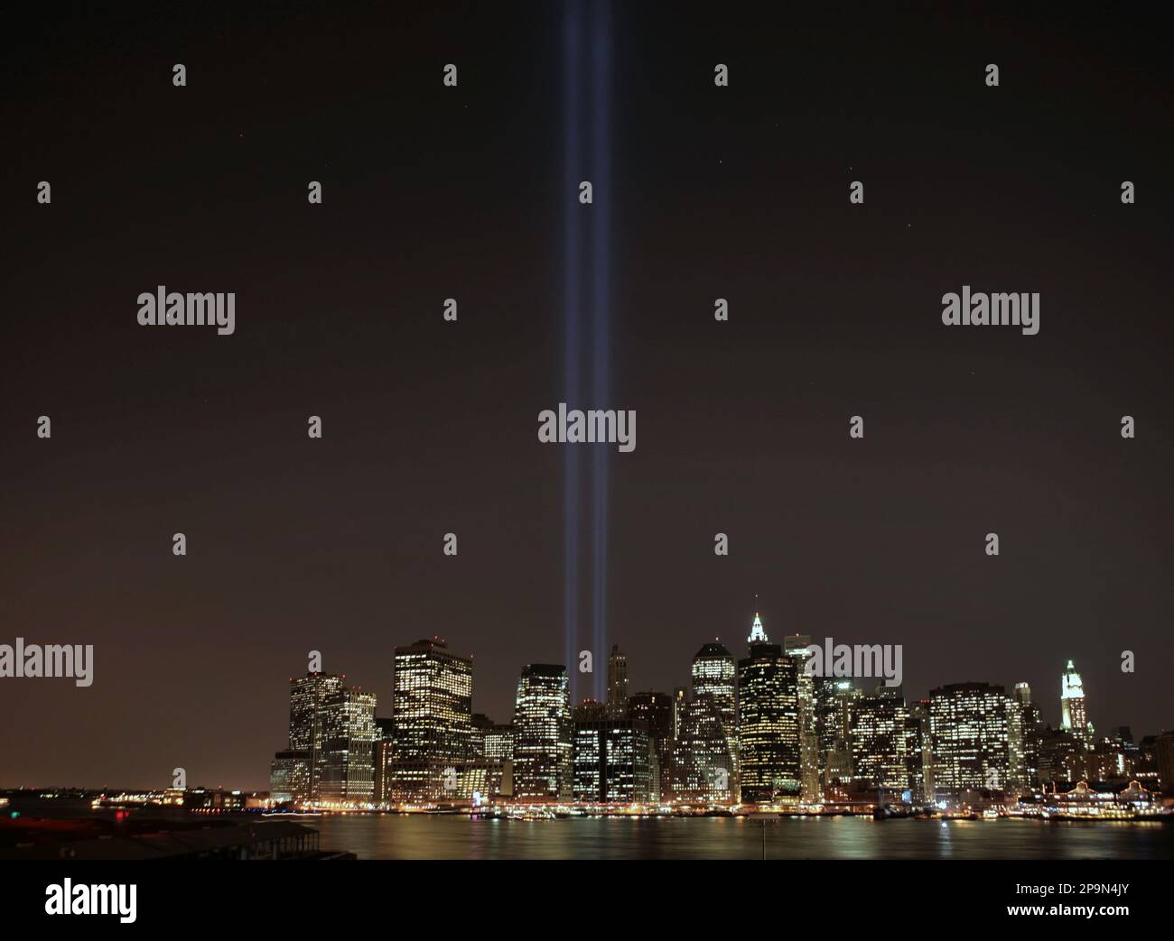 Two powerful beams of lights are tested from the World Trade Center ...