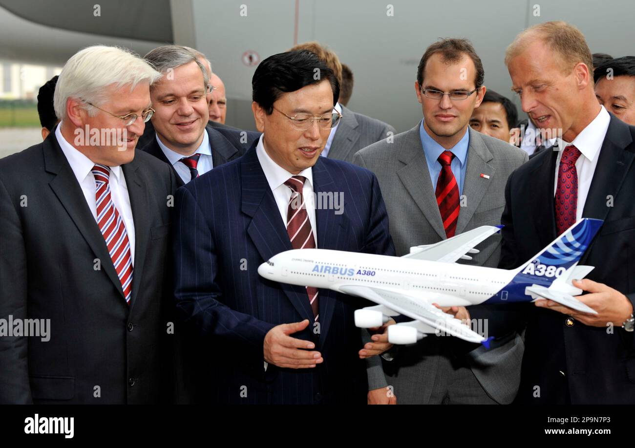Airbus CEO Thomas Enders, right, hands a model of an Airbus A380 to ...