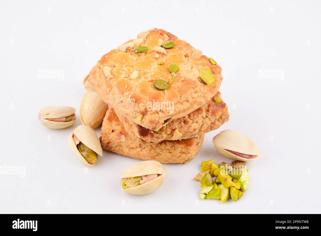 Closeup of Pista Biscuit on white background, sweet snack Stock Photo ...
