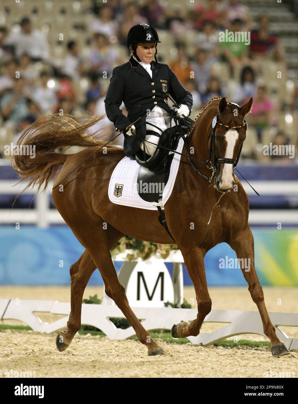 Angelika Trabert of Germany rides Londria 2 during the Equestrian ...
