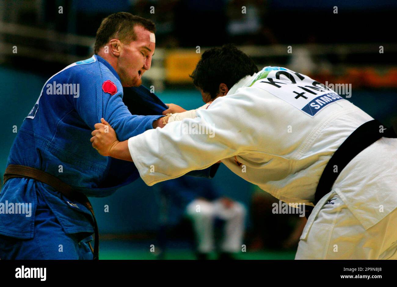 United States' Greg Dewall, left, fights with South Korea's Park Jung ...