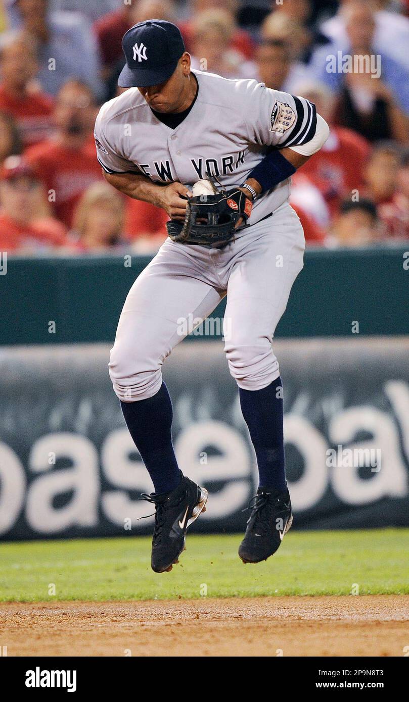New York Yankees' Alex Rodriguez traps a grounder by Los Angeles Angels ...
