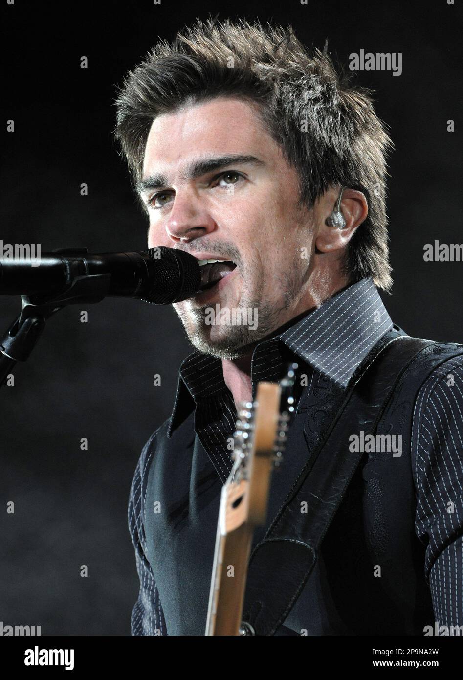 ** FILE ** Columbian Singer Juanes performs at Madison Square Garden to ...