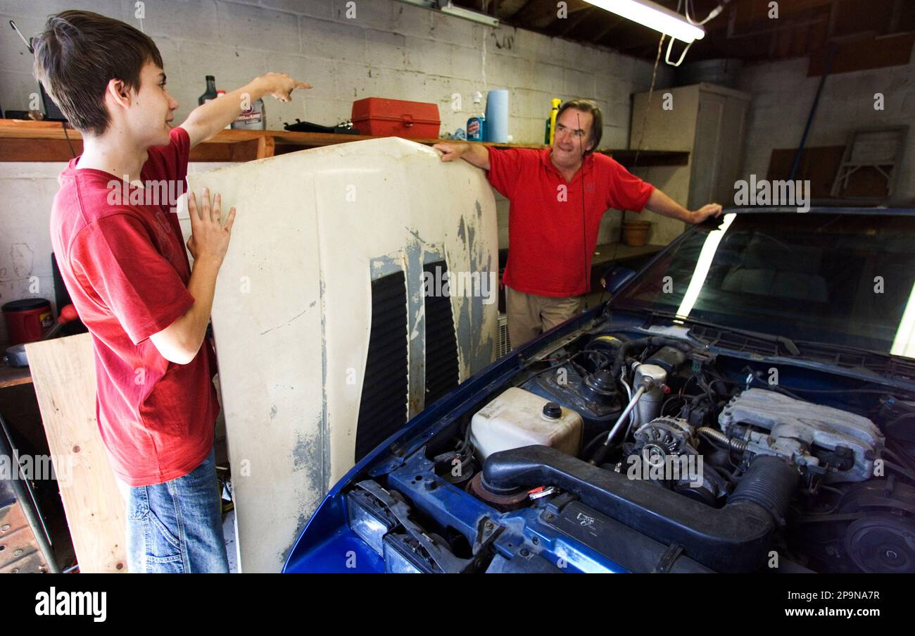**FOR USE WITH AP SPECIAL EDITION** Jim Walters, right, and his son ...