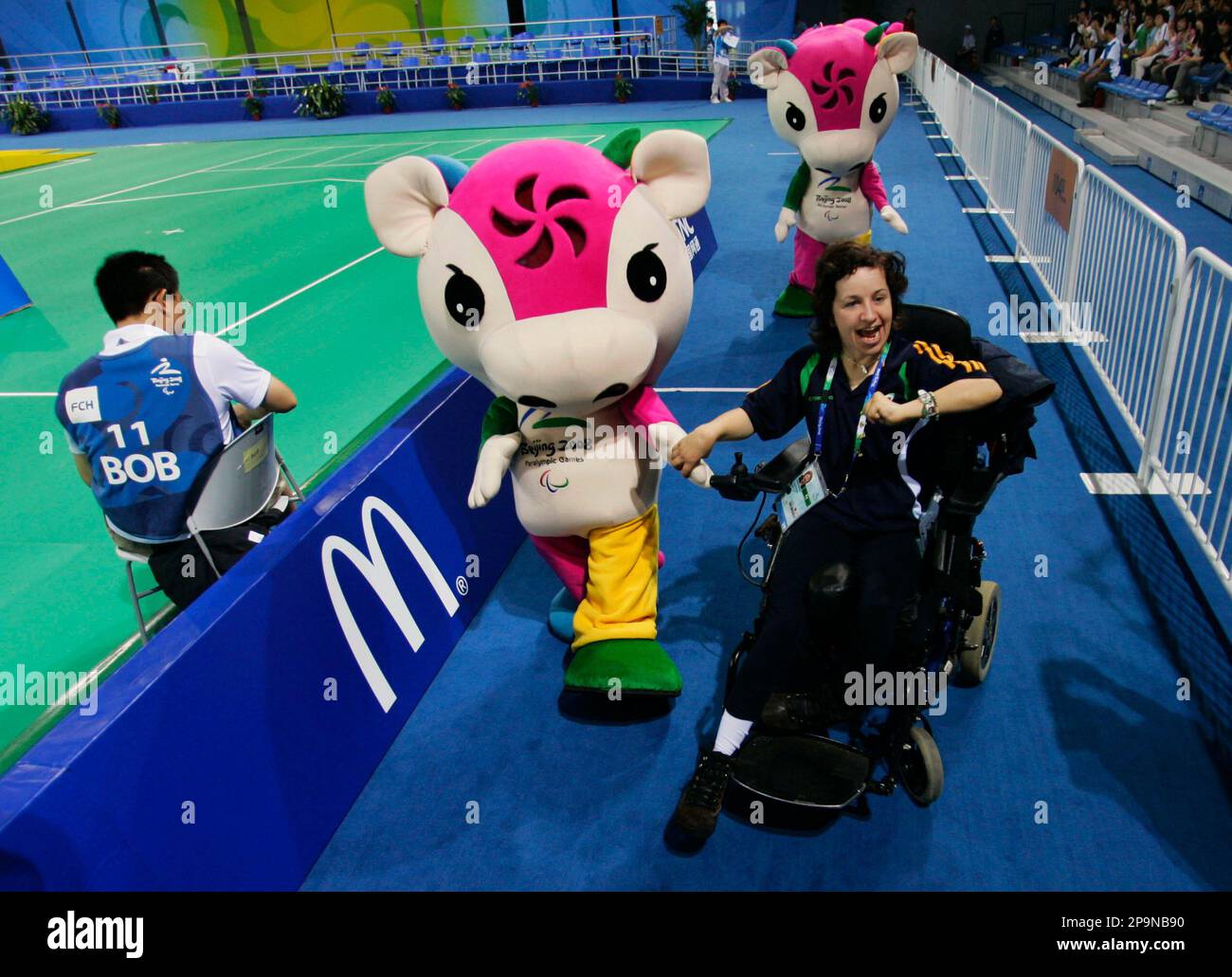 An Irish paralypmic athlete celebrates with the Paralympics' mascot ...