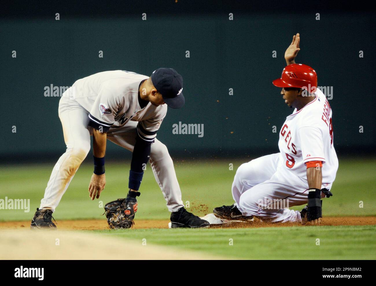 Los Angeles Angels Chone Figgins, right, steals second base before New ...